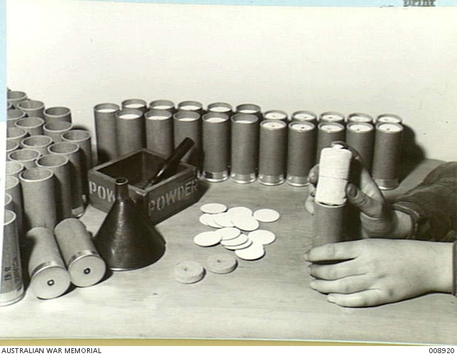 GIRLS IN A MELBOURNE FACTORY ARE MAKING CARDBOARD SHELLS OF A SPECIAL ...