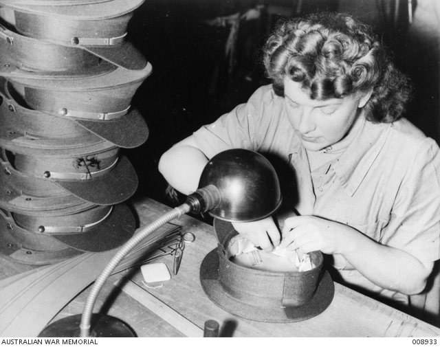 Milly Anderson’s job is finishing officer’s caps. Factories produce all ...