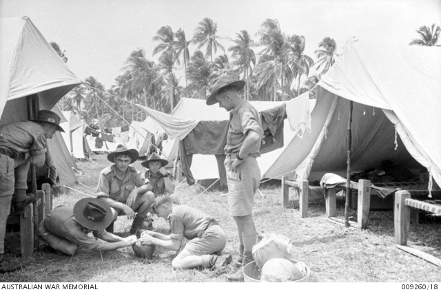 Malaya. Members of the 8th Division AIF, doing their washing in camp ...