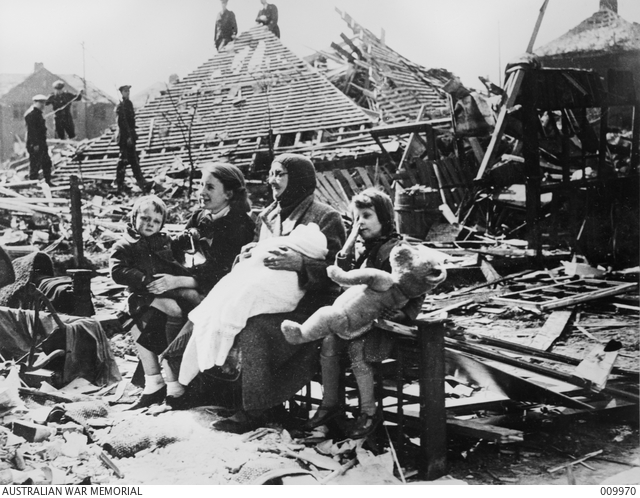 68 YEAR OLD MRS. MANSON, PICTURED SITTING ON THE WRECKAGE OF HER ...