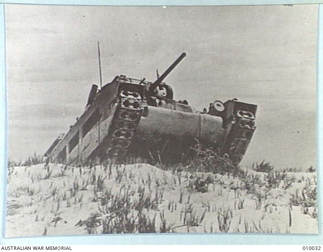 TANKS IN THE DESERT. THESE TANKS SEEN GOING UP TO THE FORWARD POSITION ...