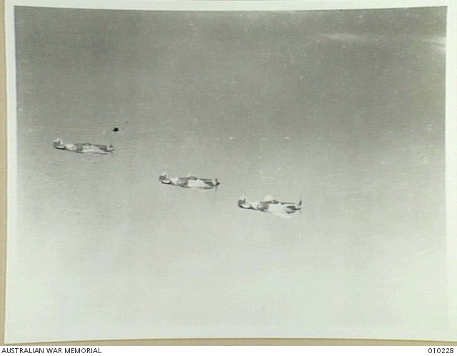 WESTERN DESERT. TOMAHAWKS IN FLIGHT. ONE OF THE PILOTS OF THIS SQUADRON ...