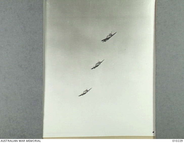 WESTERN DESERT. TOMAHAWKS IN FLIGHT. ONE OF THE PILOTS OF THIS SQUADRON ...