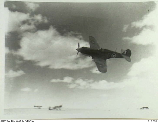 WESTERN DESERT. TOMAHAWK IN FLIGHT. ONE OF THE PILOTS OF THIS SQUADRON ...