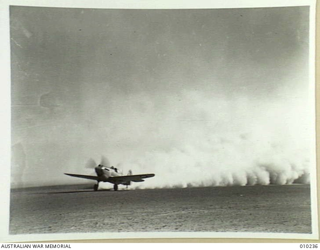 WESTERN DESERT. TOMAHAWK IN FLIGHT. ONE OF THE PILOTS OF THIS SQUADRON ...