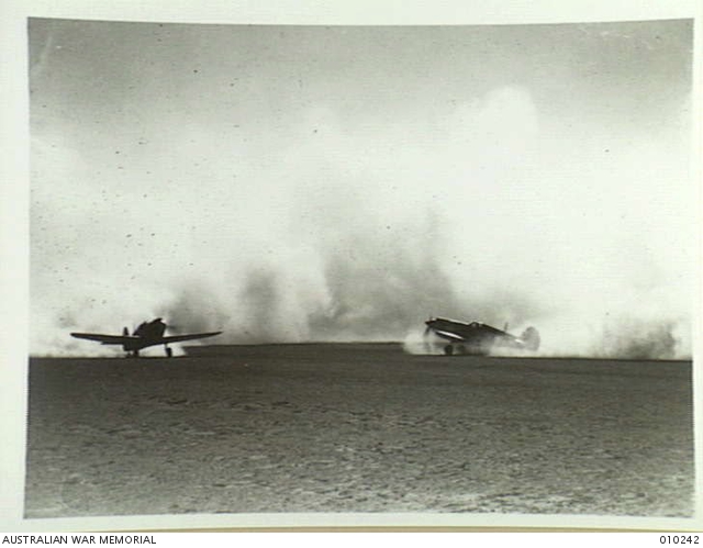 WESTERN DESERT. TOMAHAWKS IN FLIGHT. ONE OF THE PILOTS IN THIS SQUADRON ...