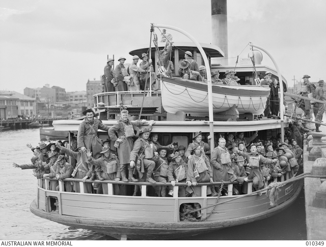 SYDNEY EMBARKATION. A FERRY LOAD AT THE EMBARKATION WHARF ...