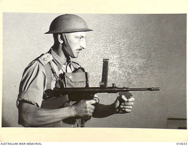 THE OWEN GUN CAN BE FIRED EITHER FROM THE SHOULDER OR HIP. | Australian ...