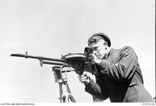 An unidentified Empire Air Training Scheme (EATS) trainee operating a ...