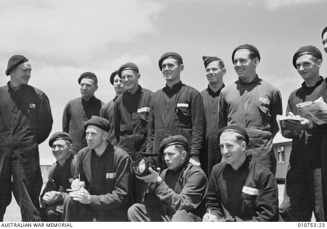 A group of Empire Air Training Scheme (EATS) trainees receiving ...