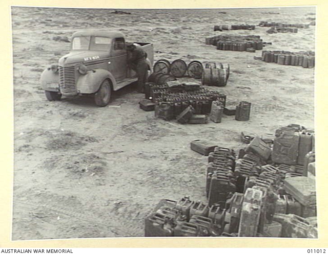 A GERMAN PETROL DUMP CAPTURED DURING THE 8TH ARMY'S ADVANCE IN LIBYA ...