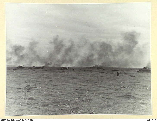 TANKS AND MOTOR VEHICLES UNDER REPAIR AT A GERMAN FIELD WORKSHOP UNIT ...