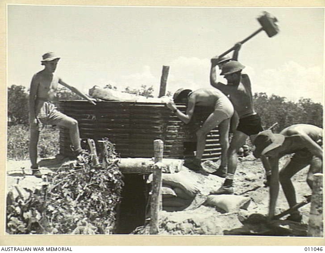 DARWIN. SOLDIERS DIGGING GUN EMPLACEMENTS OUT OF SOLID ROCK ...