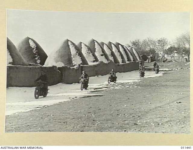 AUSTRALIAN MOTOR CYCLE PATROL APPROACHING VILLAGE OF NERAB IN N. SYRIA ...