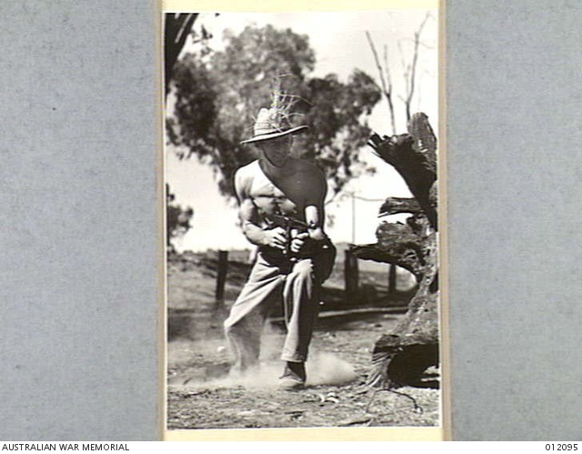 AN AUSTRALIAN SOLDIER LEARNS HOW BEST TO ATTACK WITH A THOMPSON ...