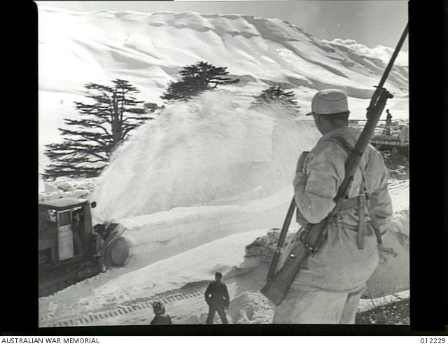 Snow sprays up as Australian soldiers attending the newly opened 1 ...