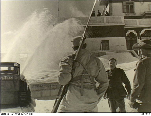 Snow sprays up as Australian soldiers attending the newly opened 1 ...