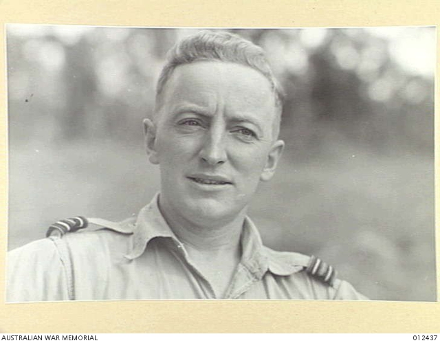 FLIGHT LIEUT. A. DUNNE, PILOT OF AN AUSTRALIAN BOMBER AT PRESENT ...