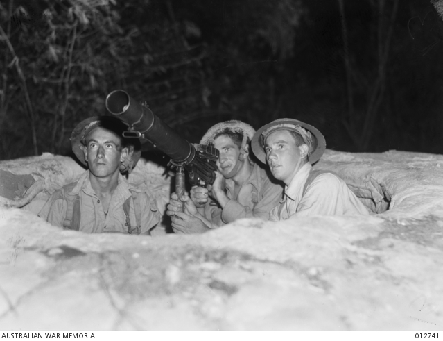 MACHINE GUN CREW ON ANTI AIRCRAFT DUTY IN THE DARWIN AREA. THE SAFETY ...