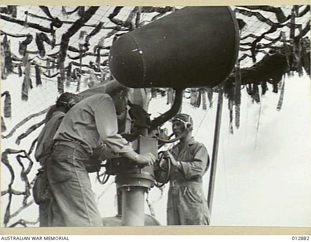 AT AN UNDISCLOSED OPERATIONAL BASE. HIDDEN UNDER ITS EFFECTIVE ...