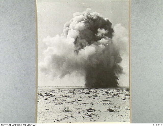 INGLORIOUS END OF A GERMAN TANK. A BRITISH BOMB FALLS DIRECTLY ON TO A ...