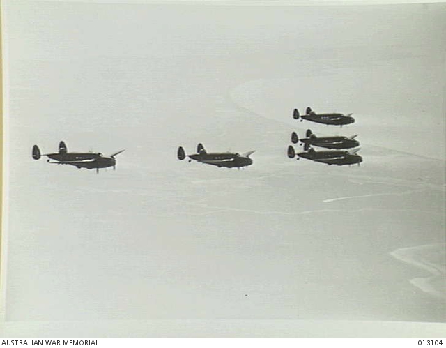 A FORMATION OF LOCKHEED HUDSON BOMBER AIRCRAFT CROSSING THE COAST ...