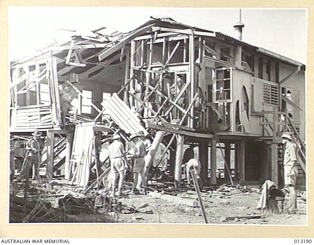 DARWIN. ALLIED TROOPS CLEAR AWAY WRECKAGE AFTER A RECENT JAPANESE AIR ...