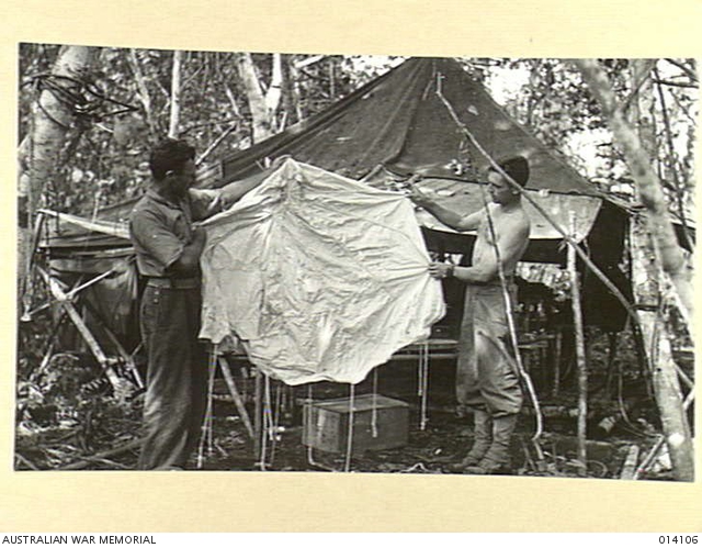 NEW GUINEA. TO FEED TROOPS IN THE BUNA AREA SUPPLIES WERE DROPPED BY ...