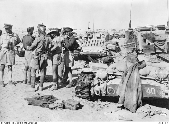COUNTING THE COST. THIS SHOT WAS TAKEN SHORTLY AFTER A DECISIVE TANK ...