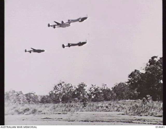 NEW GUINEA. LOCKHEED LIGHTNINGS (P38) IN FLIGHT. (NEGATIVE BY N. BROWN ...