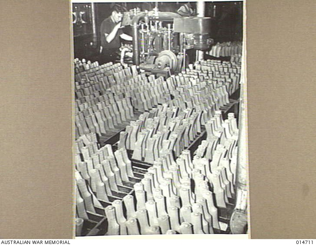 AUSTRALIA AT WAR. THIS PICTURE SHOWS ERIC KEATING SURROUNDED BY A SEA ...