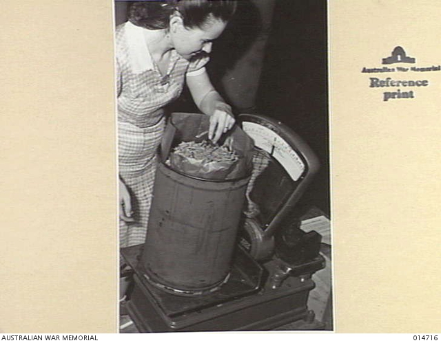 AUSTRALIA AT WAR. THIS PICTURE SHOWS MRS REVA SCOTT, WHOSE HUSBAND IS ...