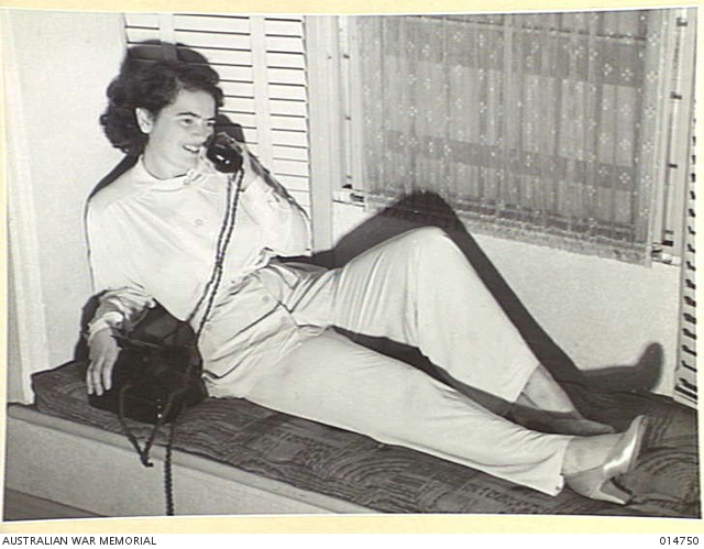 AUSTRALIA AT WAR. THIS PICTURE SHOWS MISS MARIE HILLARD RELAXING IN ...