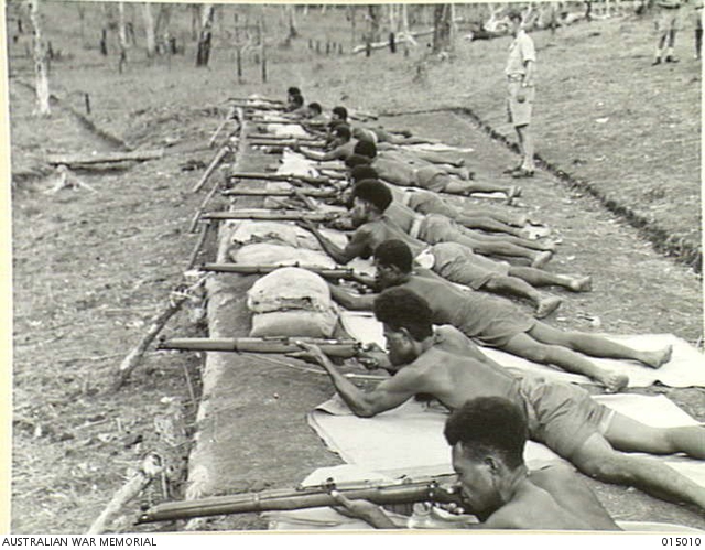 Locally engaged soldiers at a rifle range at a Papuan infantry unit ...