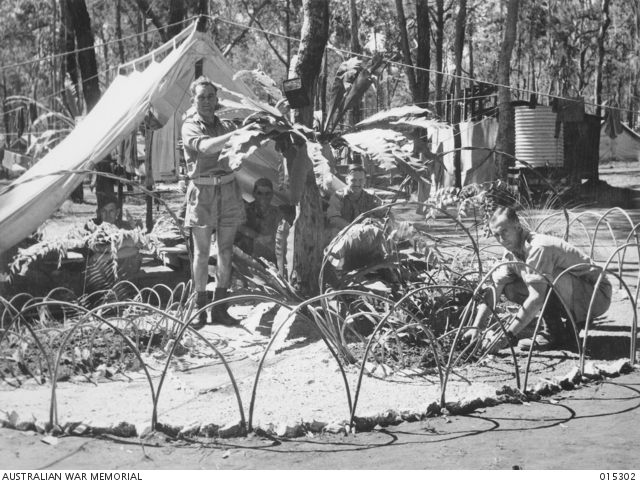 NINTH DIVISION A.I.F. AT CAMP SOMEWHERE IN THE SOUTHWEST PACIFIC. THIS ...