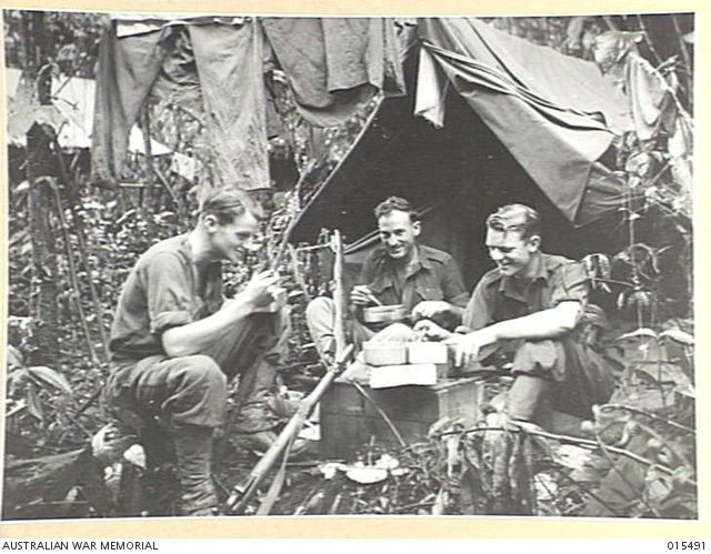 NEW GUINEA. MOUNT TAMBU FIGHTING. SGT. DOUG. BAXTER OF NORTHCOTE, VIC ...