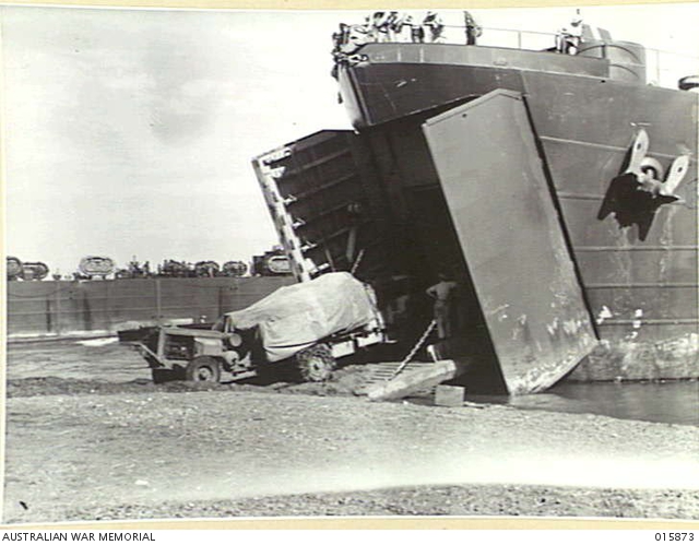 At the embarkation point, a truck towing a Bofors gun is driven into a ...