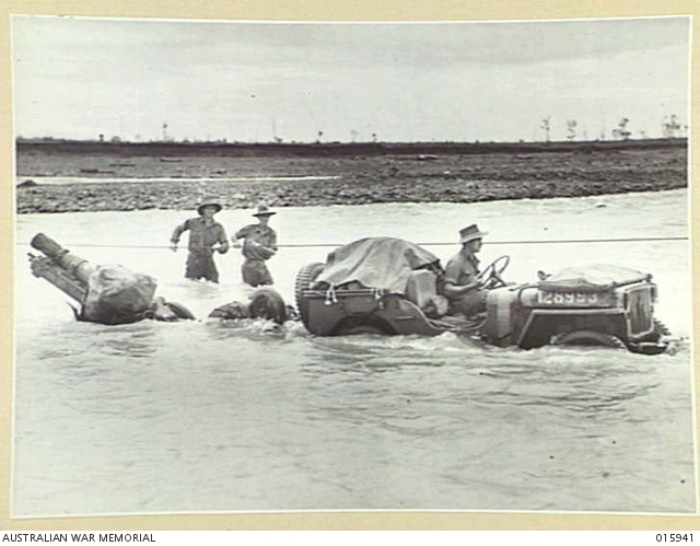 NEW GUINEA. MARKHAM VALLEY ADVANCE. EQUIPMENT BEING TAKEN ACROSS THE 18 ...
