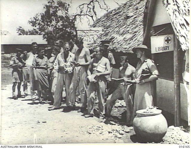 NEW GUINEA. RED CROSS WORKERS AND CONVALESCENTS AT A RED CROSS CENTRE ...