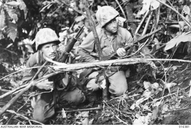 New Britain. In the jungle, guns at the ready, after landing at Cape ...