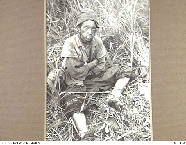 NEW GUINEA. THIS JAPANESE PRISONER OF WAR (POW) WAS LEFT BEHIND BY HIS ...