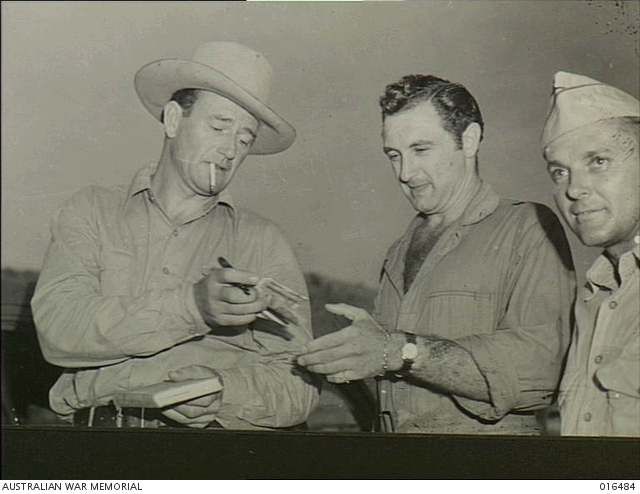 New Guinea. Autograph hunter Private Frank Pulaski of New York was hot ...