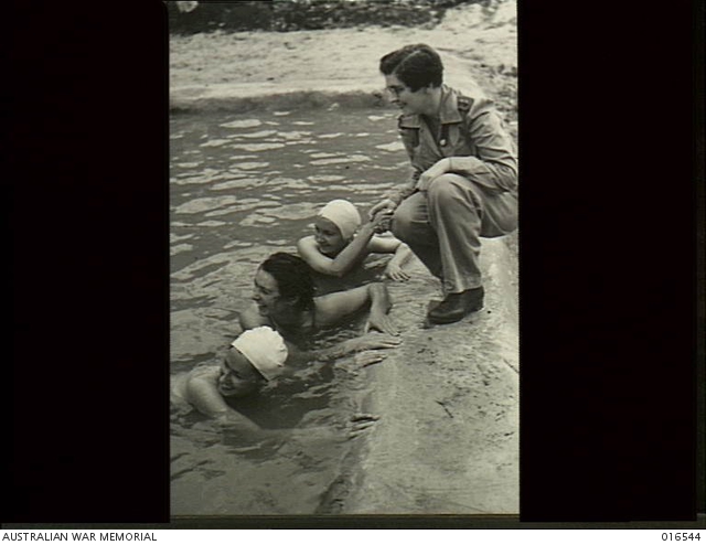 New Guinea. Swimming pool at the convalescent depot is a great boon to ...