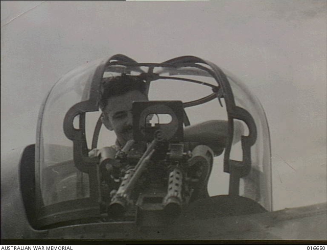 New Guinea. Ready to use the guns in a Beaufort aircraft of No. 100 ...
