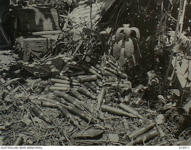 Gasmata, New Britain. Close-up of Japanese ammunition scattered near ...