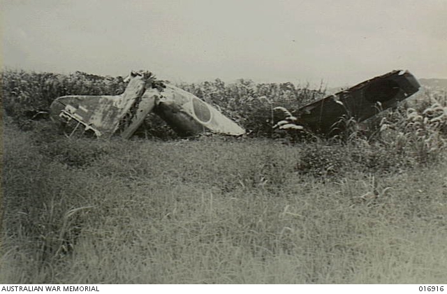Gasmata, New Britain. A wrecked Japanese Zero fighter aircraft, Allied ...