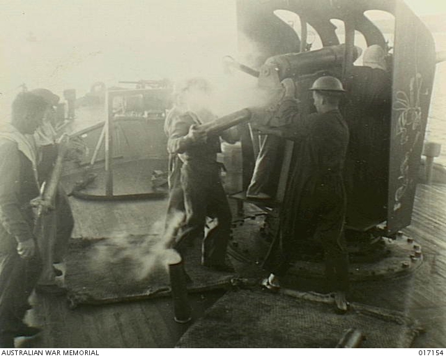 The warship HMAS Kapunda sends 4 inch shells on Japanese held Karkar ...