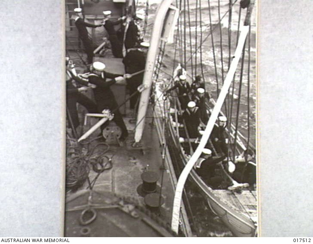 LOWERING THE SHIP'S BOAT ON THE OCCASION OF THE H.M.A.S. NEPAL'S RETURN ...