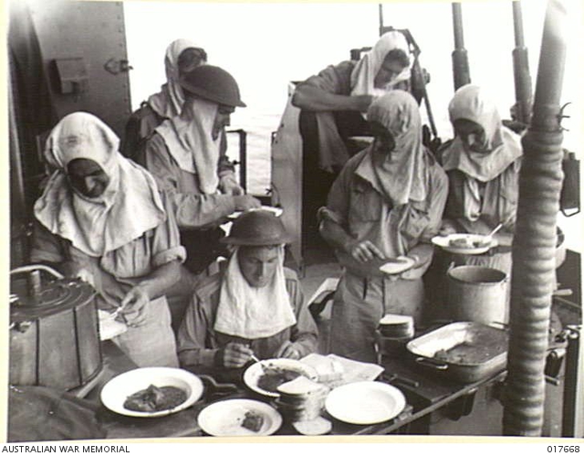 SOUTH WEST PACIFIC AREA. BREAKFAST BEING SERVED TO GUNS CREWS AT BATTLE ...
