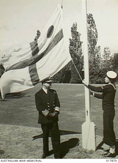 The flag goes up for the first time at the new headquarters of the ...